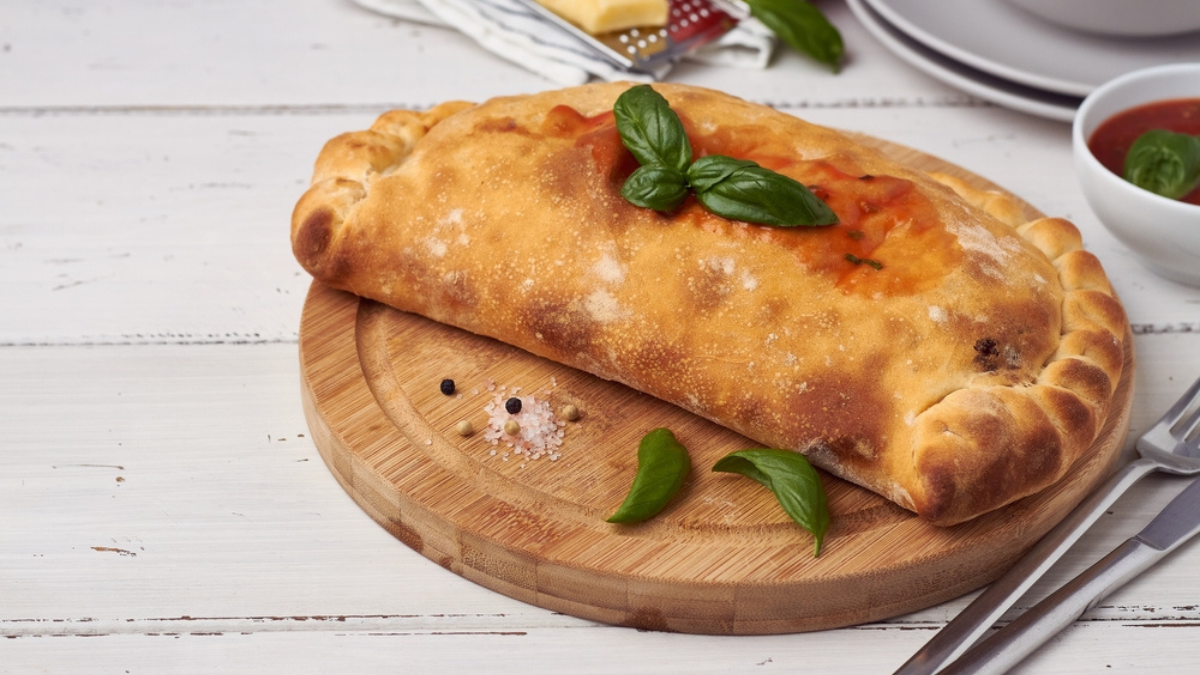 Cómo hacer un delicioso calzone casero con jamón y queso